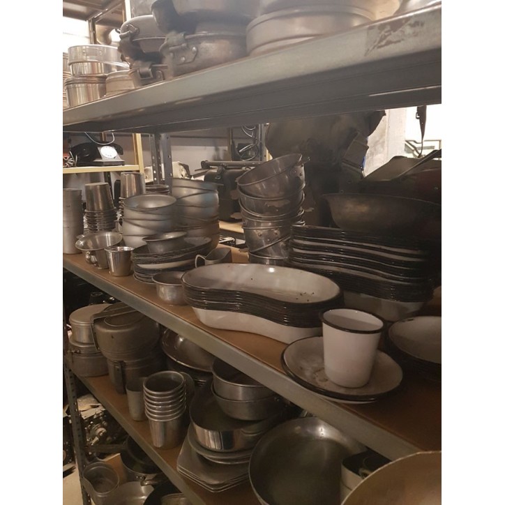 Lots of metal cutlery and plates